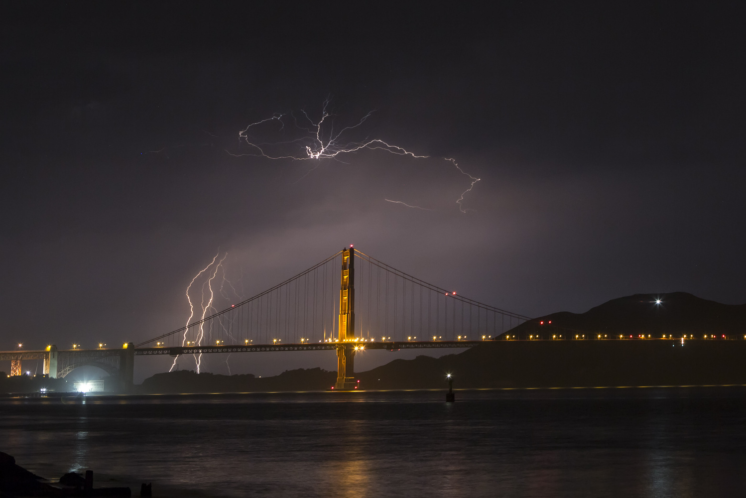 Lightning surrounding the Golden Gate Bridge - Dinno Kovic on Fstoppers
