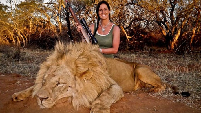 Hunting Show Host Under Fire for Posting Lion Trophy Photo on Facebook ...